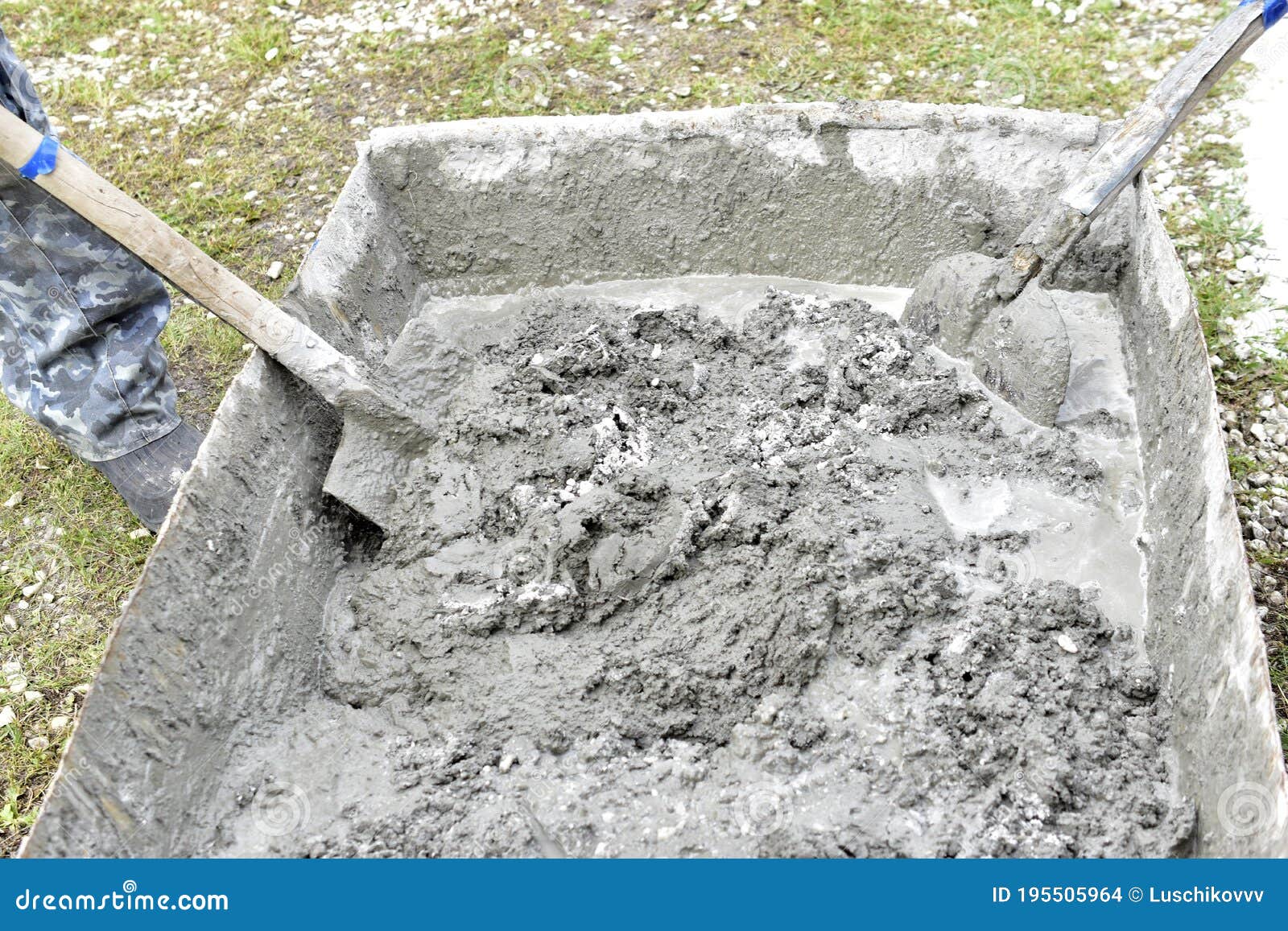 Mixing Cement in the Muld with Shovels for Construction Stock Photo ...
