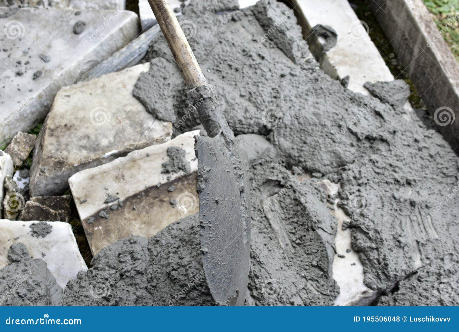 Mixing Cement in the Muld with Shovels for Construction Stock Photo ...