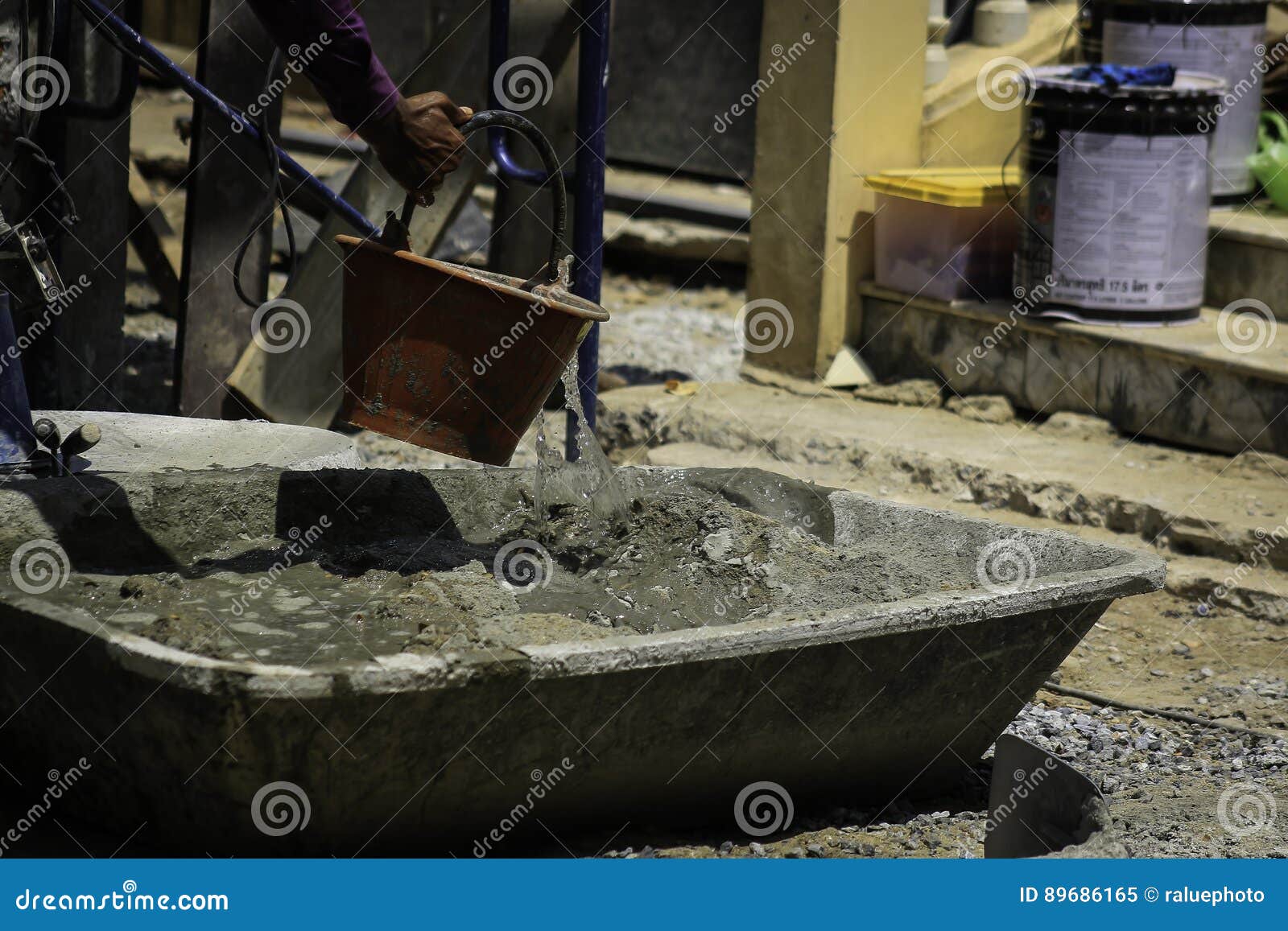 Mixing concrete with sand stock image. Image of tray - 89686165
