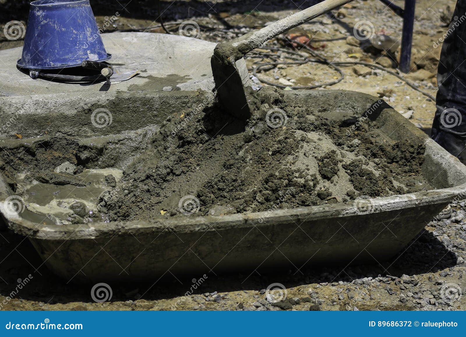 Mixing concrete with sand stock photo. Image of grunge - 89686372