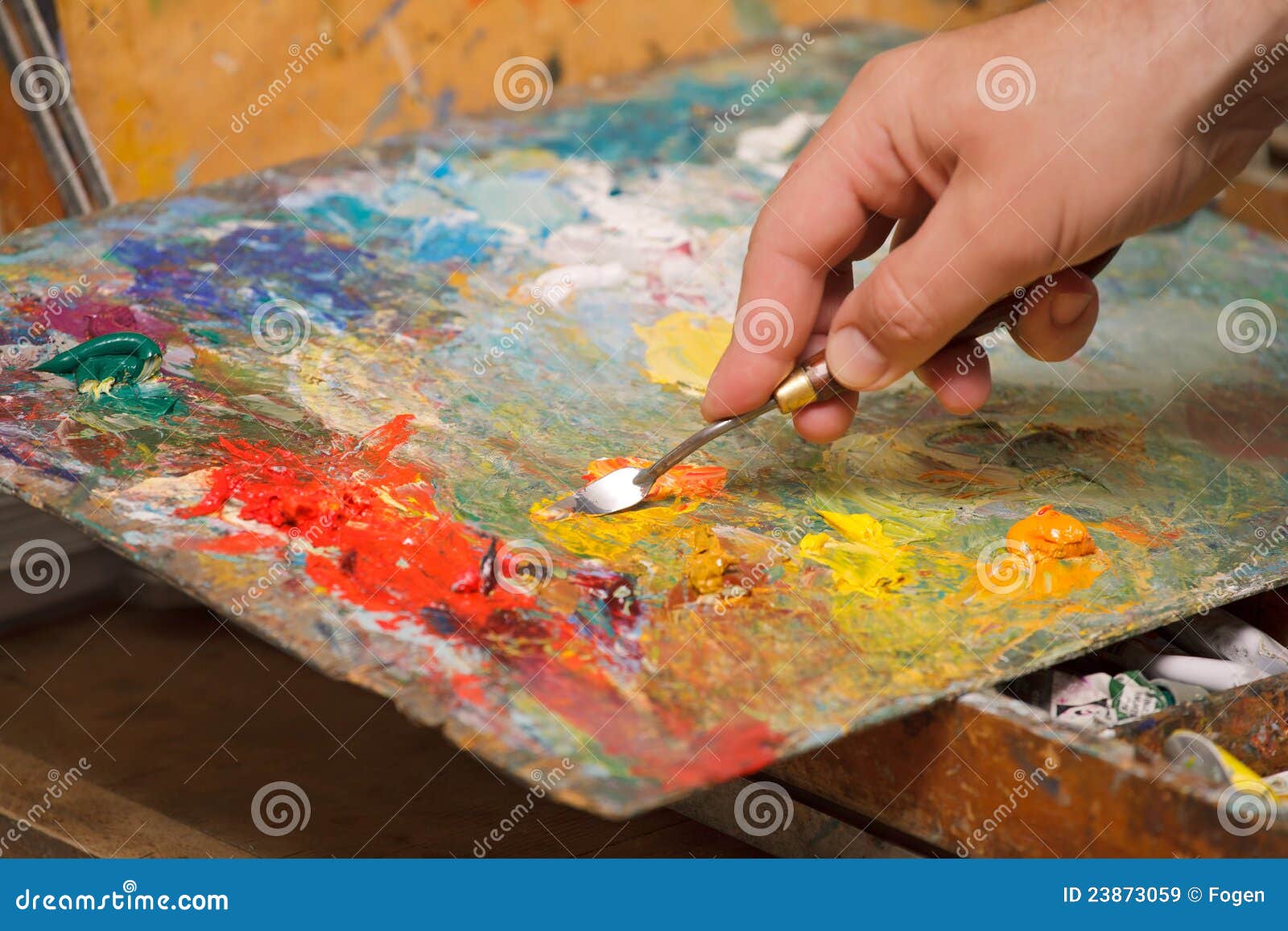 Mixing paints stock image. Image of artist, paint, orange - 23873059