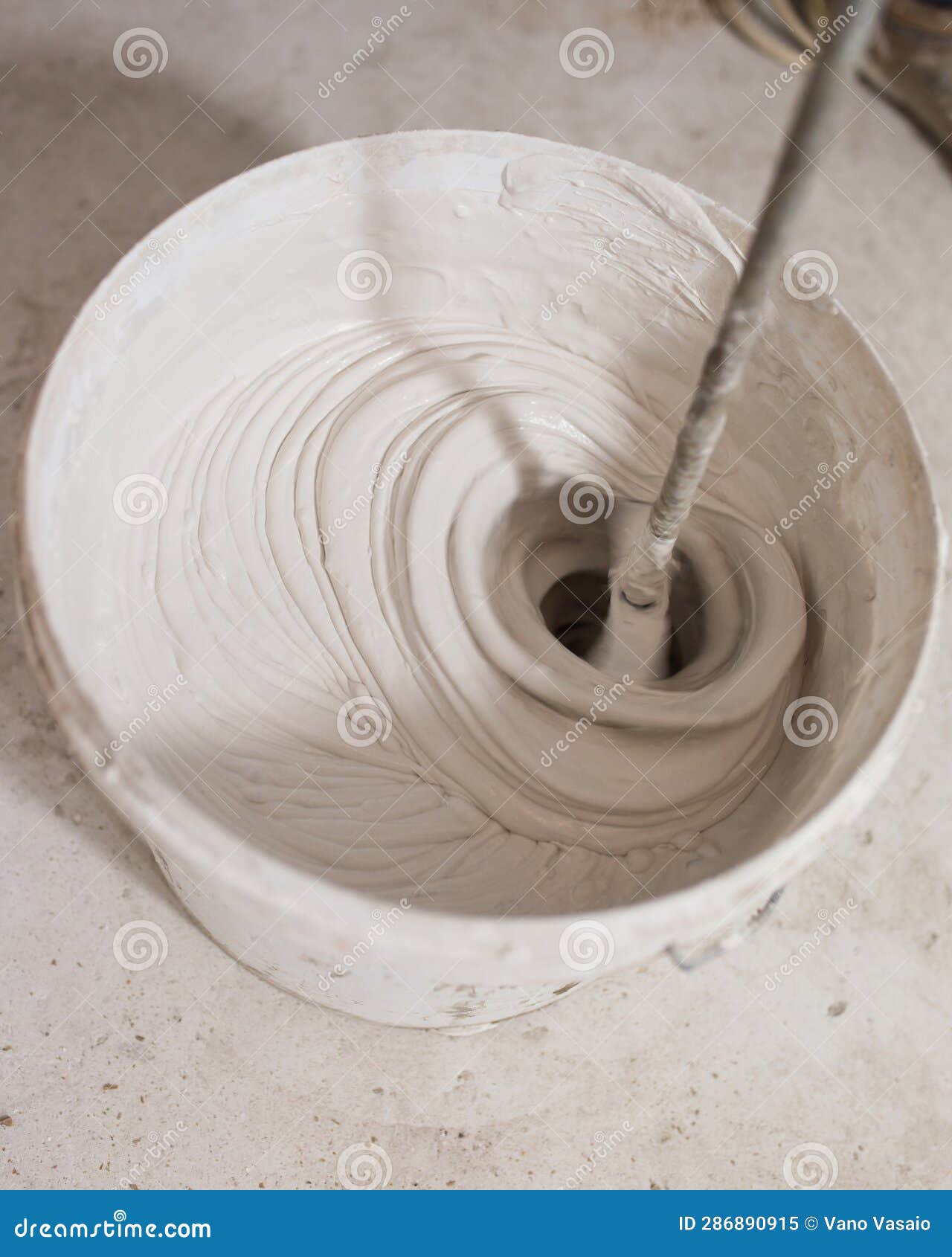 Mixing Putty in a Bucket with a Mixer Stock Image - Image of bucket ...