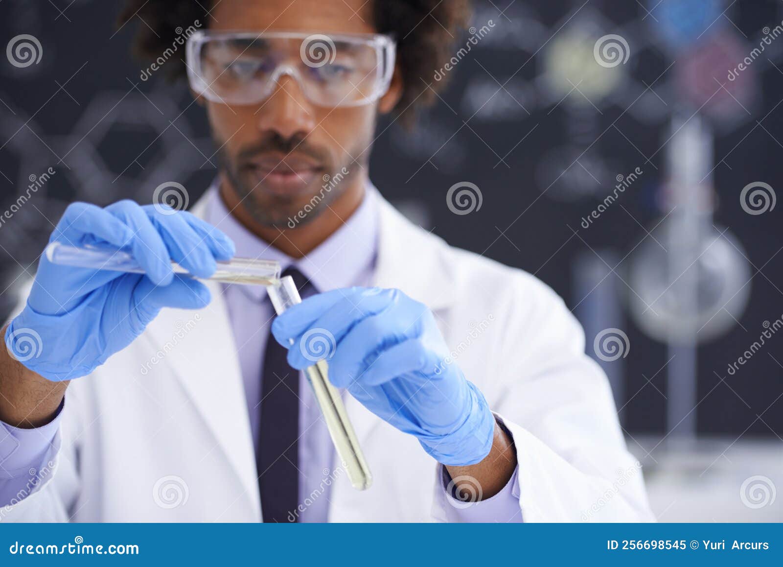 Mixing Things Up. a Male Scientist Conducting an Experiment in His Lab ...