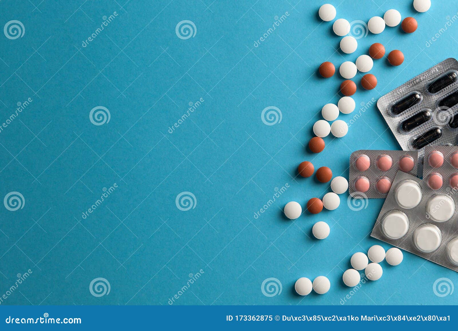 Mixture of Multiple Types of Drugs Scattered on a Blue Background Stock ...