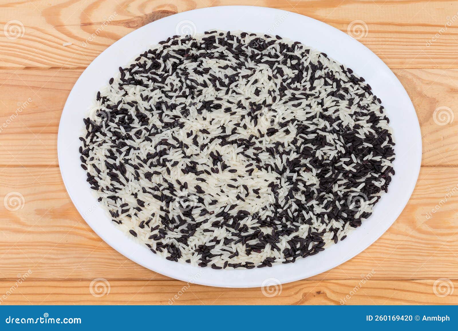 Mixture of Raw Black and White Rice on White Dish Stock Photo - Image ...