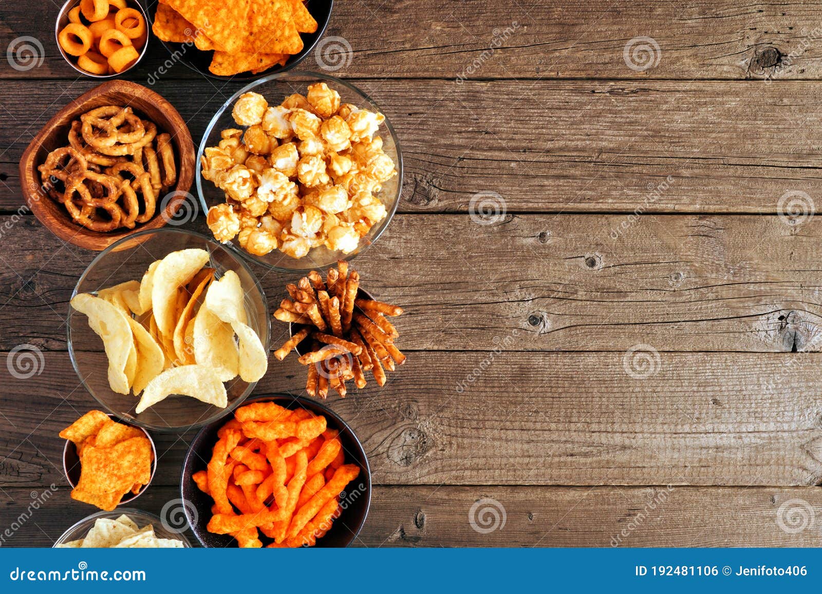 Mixture of Salty Snacks, Above View Side Border on a Wood Background ...