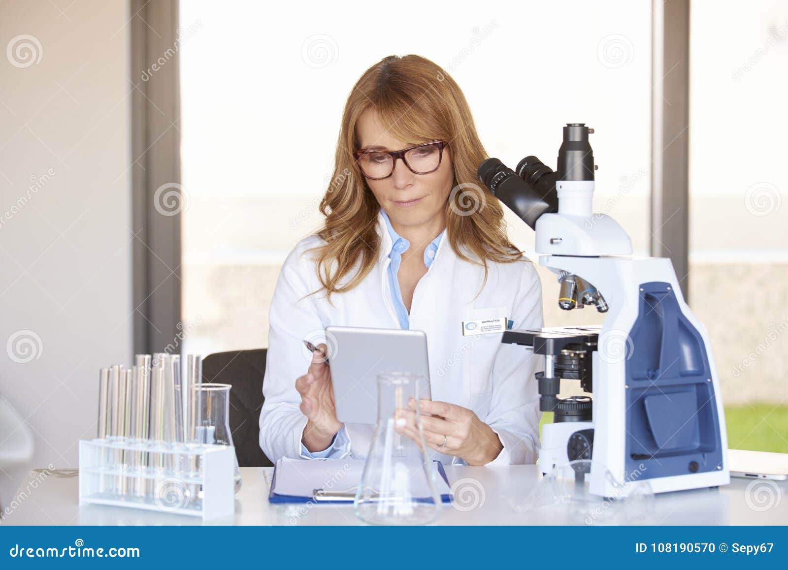 Female Scientist Working Alone in the Lab Stock Photo - Image of people ...