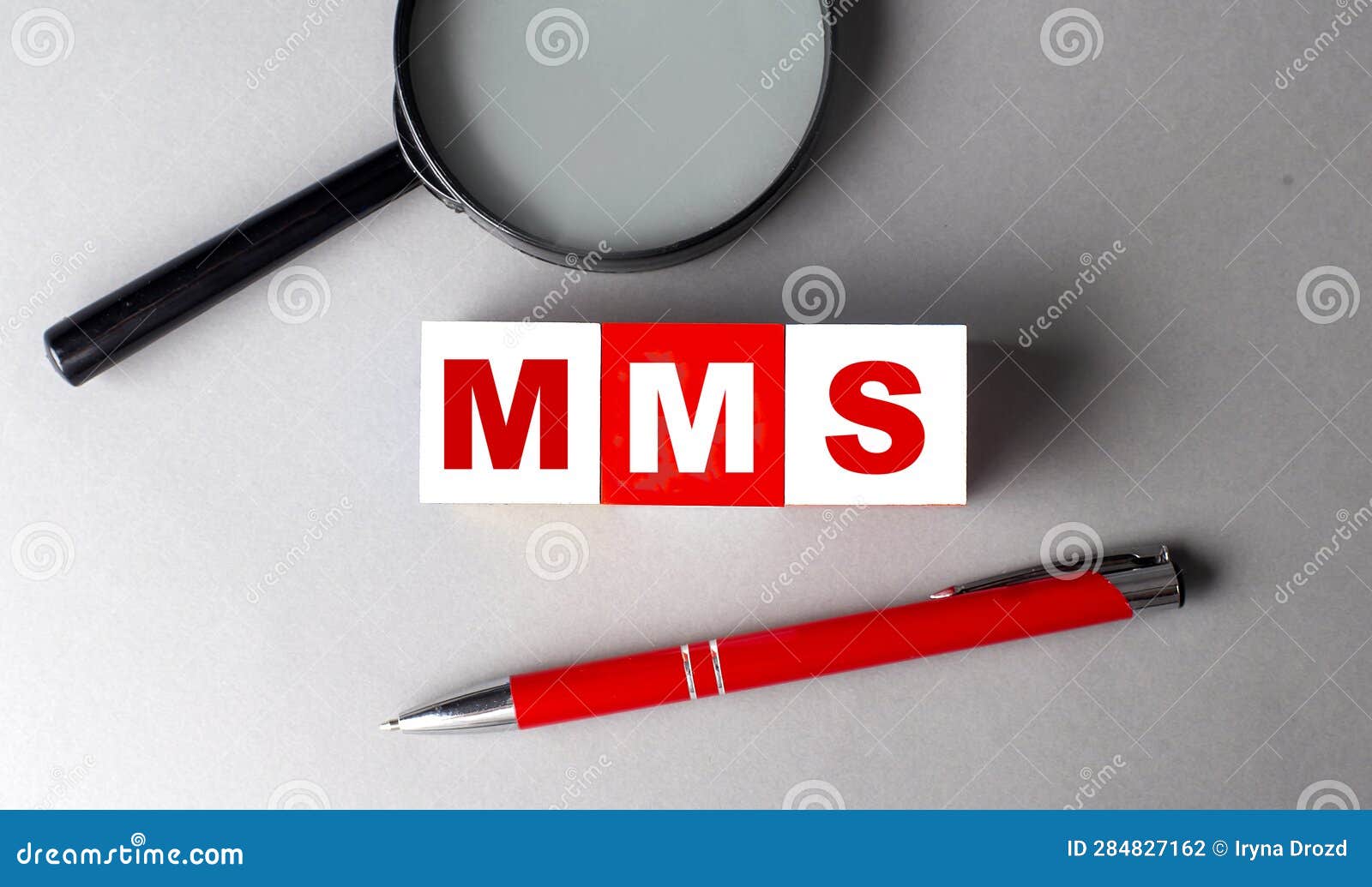 MMS Word on Wooden Cubes with Pen and Magnifier Stock Photo - Image of ...