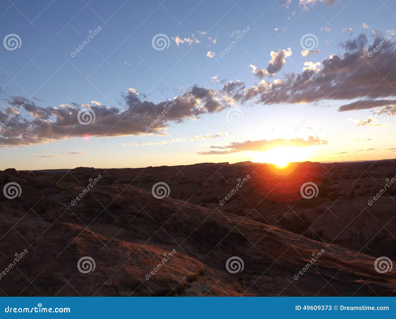 Moab Sunset stock image. Image of blue, clouds, flare - 49609373