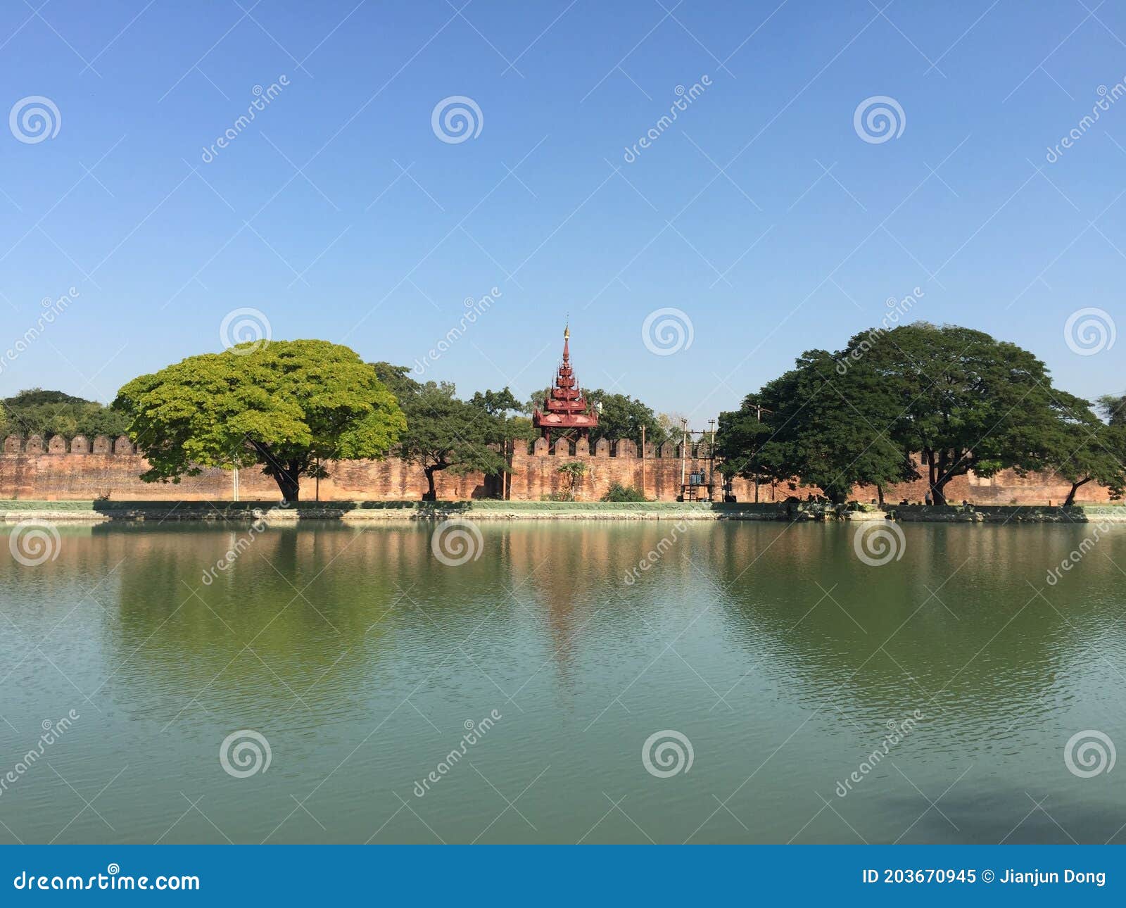The Moat Surrounds the Tree-lined City Wall Stock Image - Image of tree ...