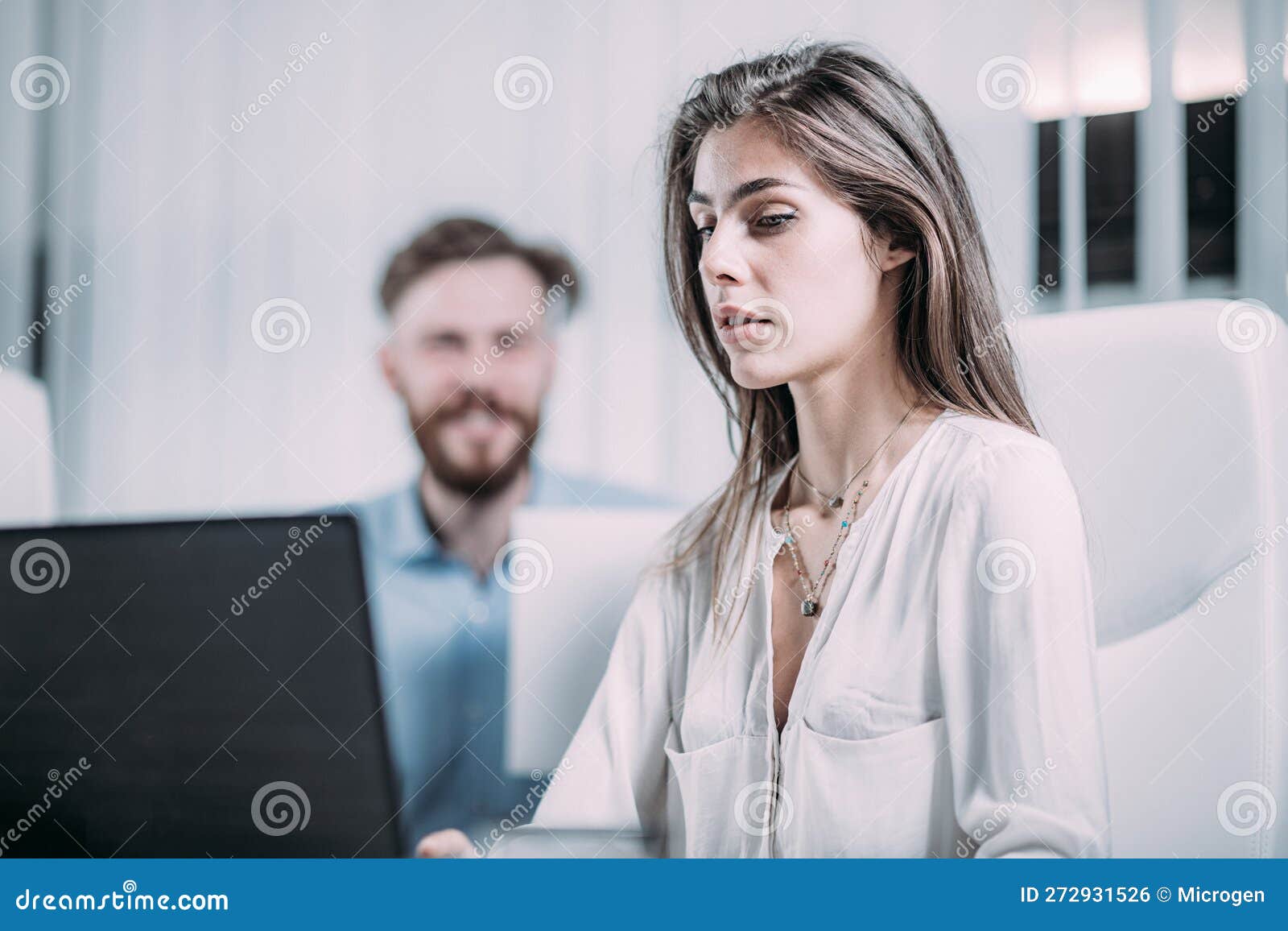 Mobbing at Work. Scared Female Employee in the Modern Office Stock ...