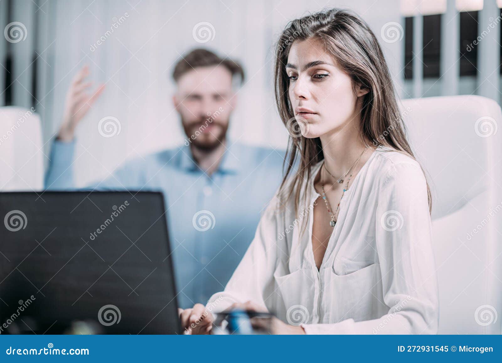 Mobbing at Work. Scared Female Employee in the Modern Office Stock ...