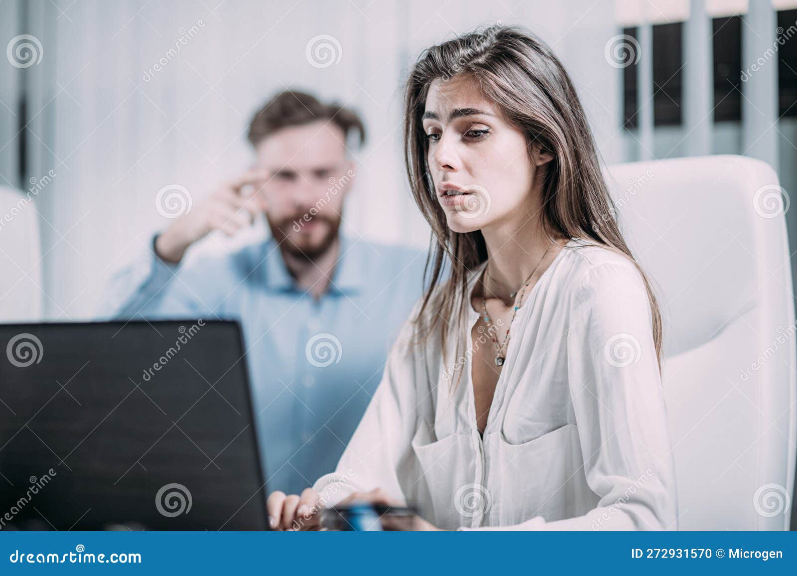 Mobbing at Work. Scared Female Employee in the Modern Office Stock ...