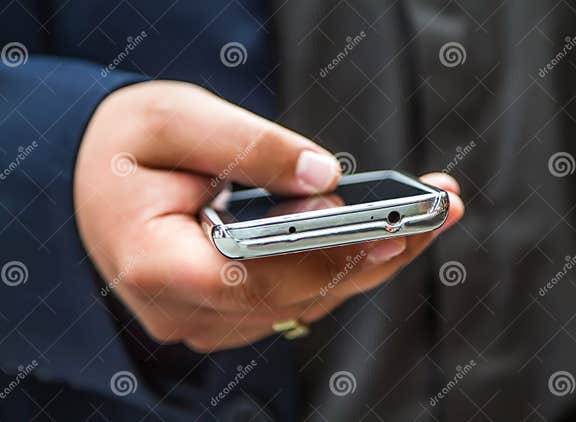Mobil phone in the hand stock image. Image of cover, eqipment - 33373675