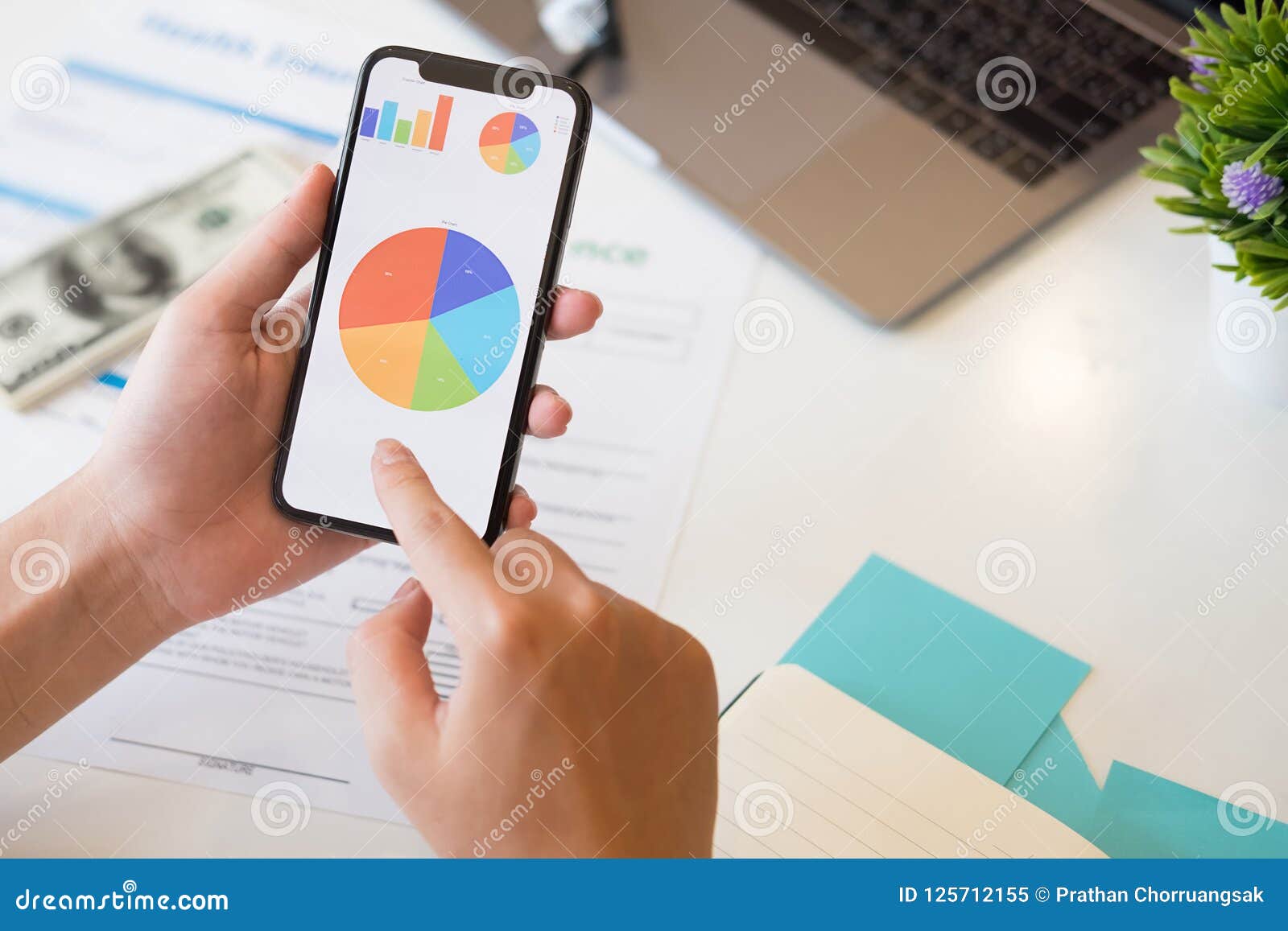 Mobile Analytics Smartphone on Business Hand with Showing Data. Stock ...