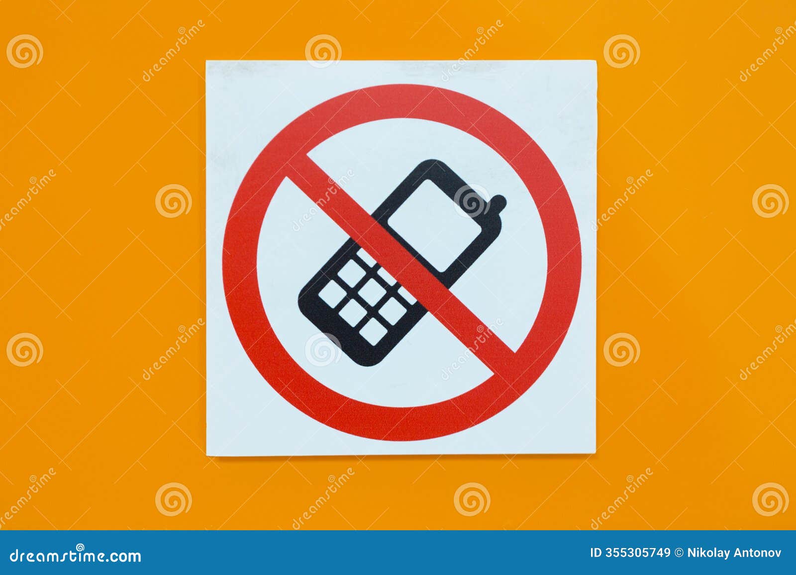 Mobile Cell Phones are Prohibited Sign on Orange Wall Stock Image ...