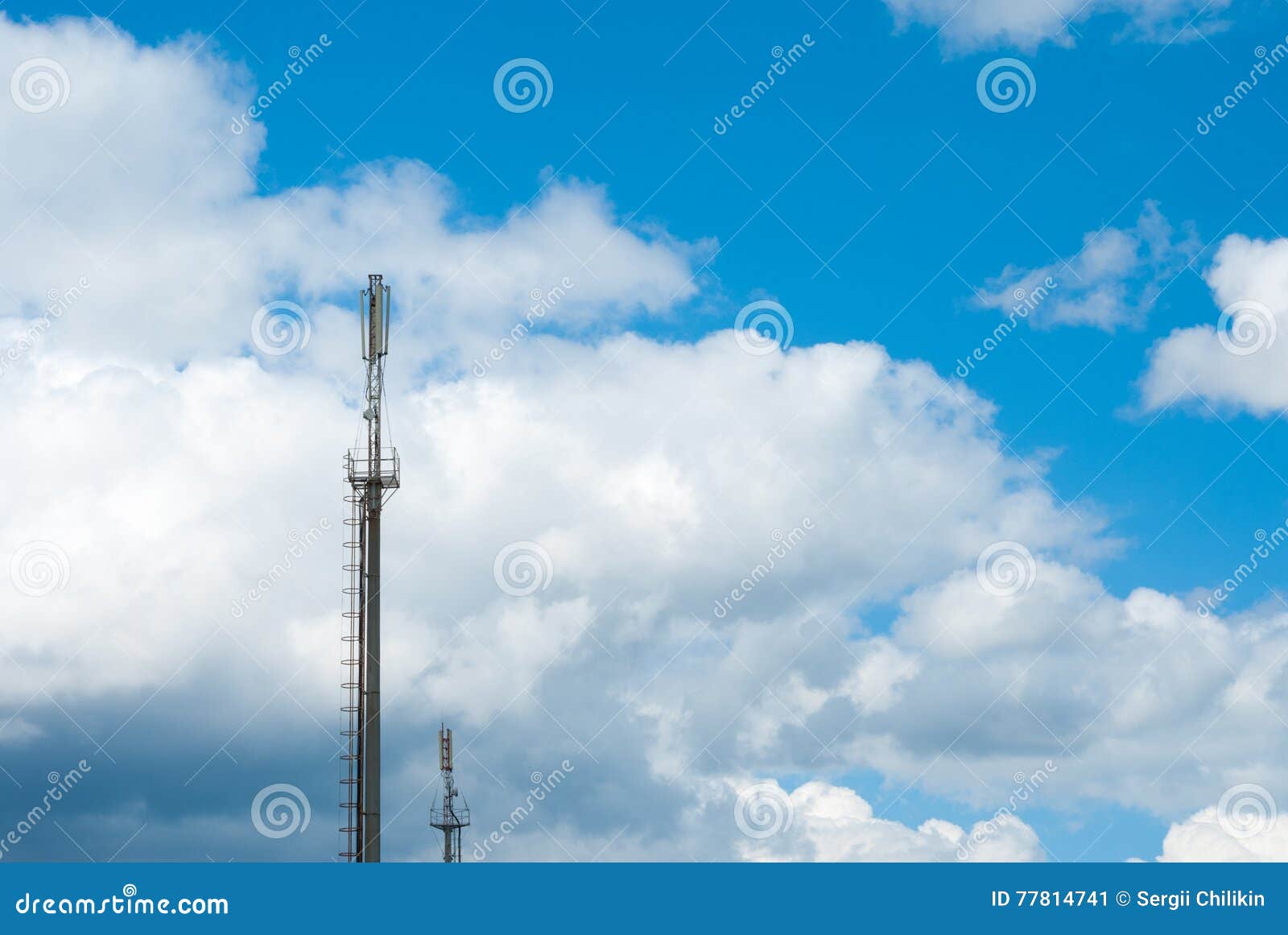 Mobile Communications Tower on the Sky Background. Large Clouds ...