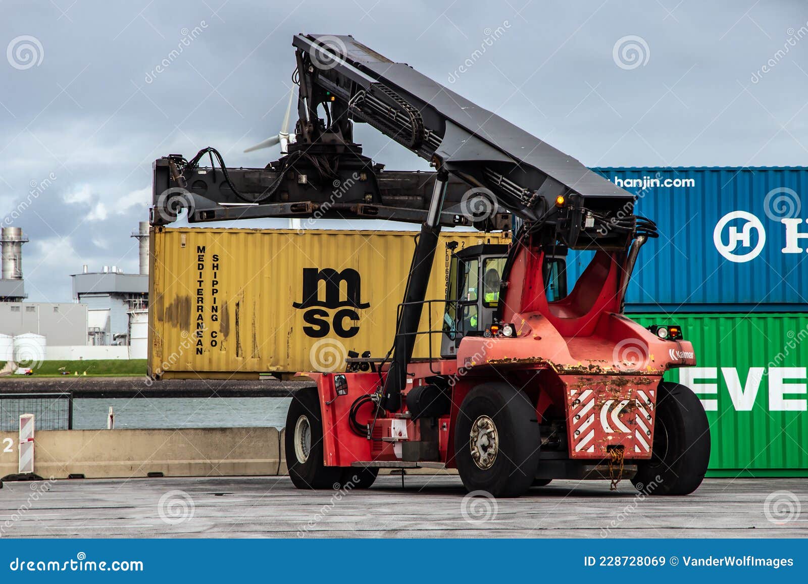 Mobile Container Handler in Action at a Container Terminal in the Port ...