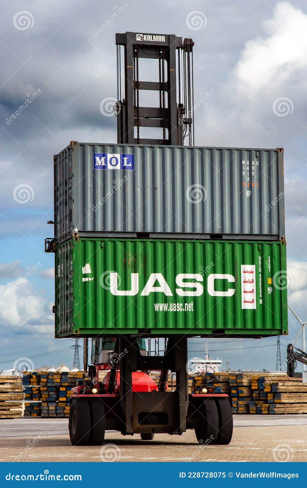 Mobile Container Handler in Action at a Container Terminal in the Port ...