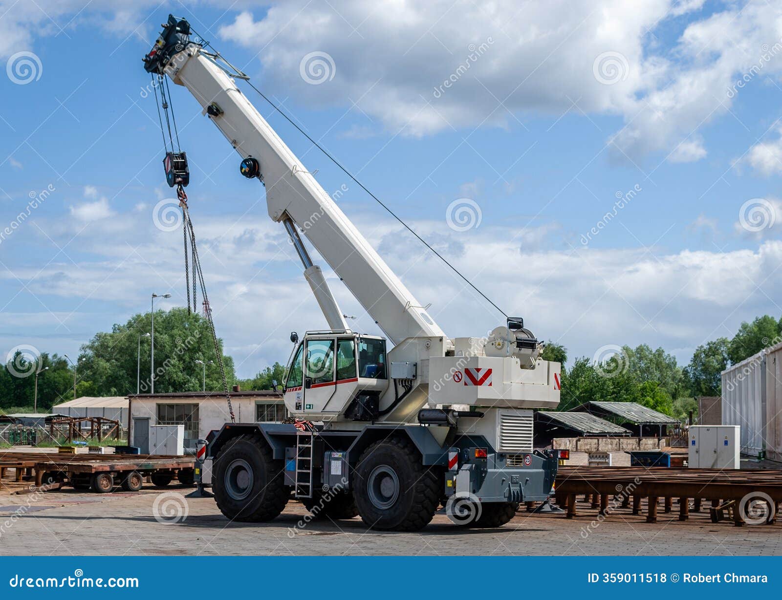 Mobile Crane Lifting a Load at a Construction Site Editorial Stock ...