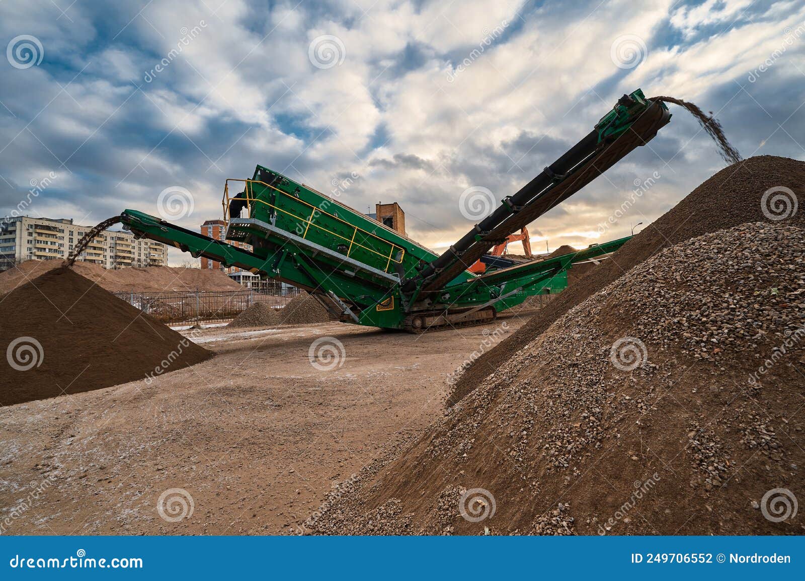 Mobile Crushing and Sorting Complex Works among Soil Piles Stock Photo ...