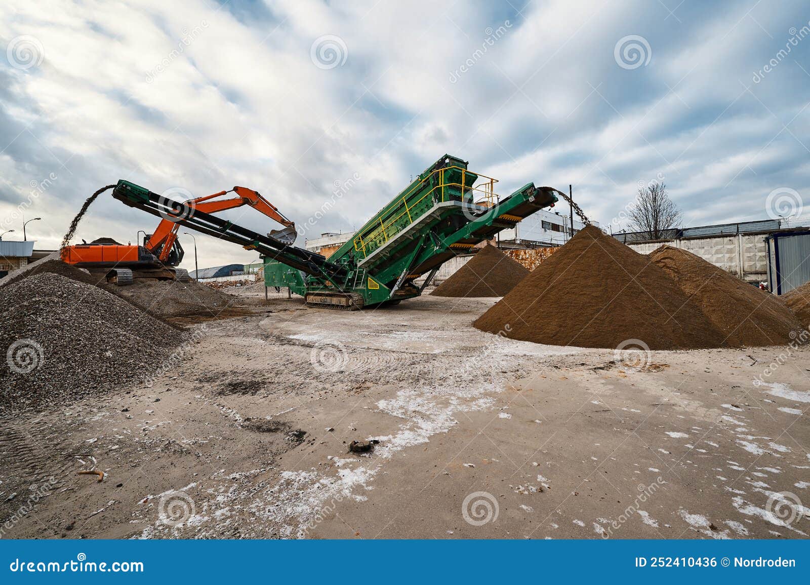 Mobile Crushing and Sorting Complex Works among Soil Piles Stock Photo ...