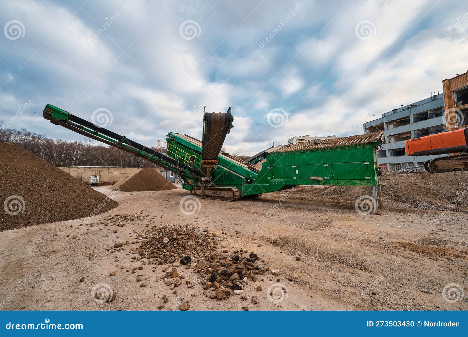 Mobile Crushing and Sorting Complex Works among Soil Piles Stock Photo ...