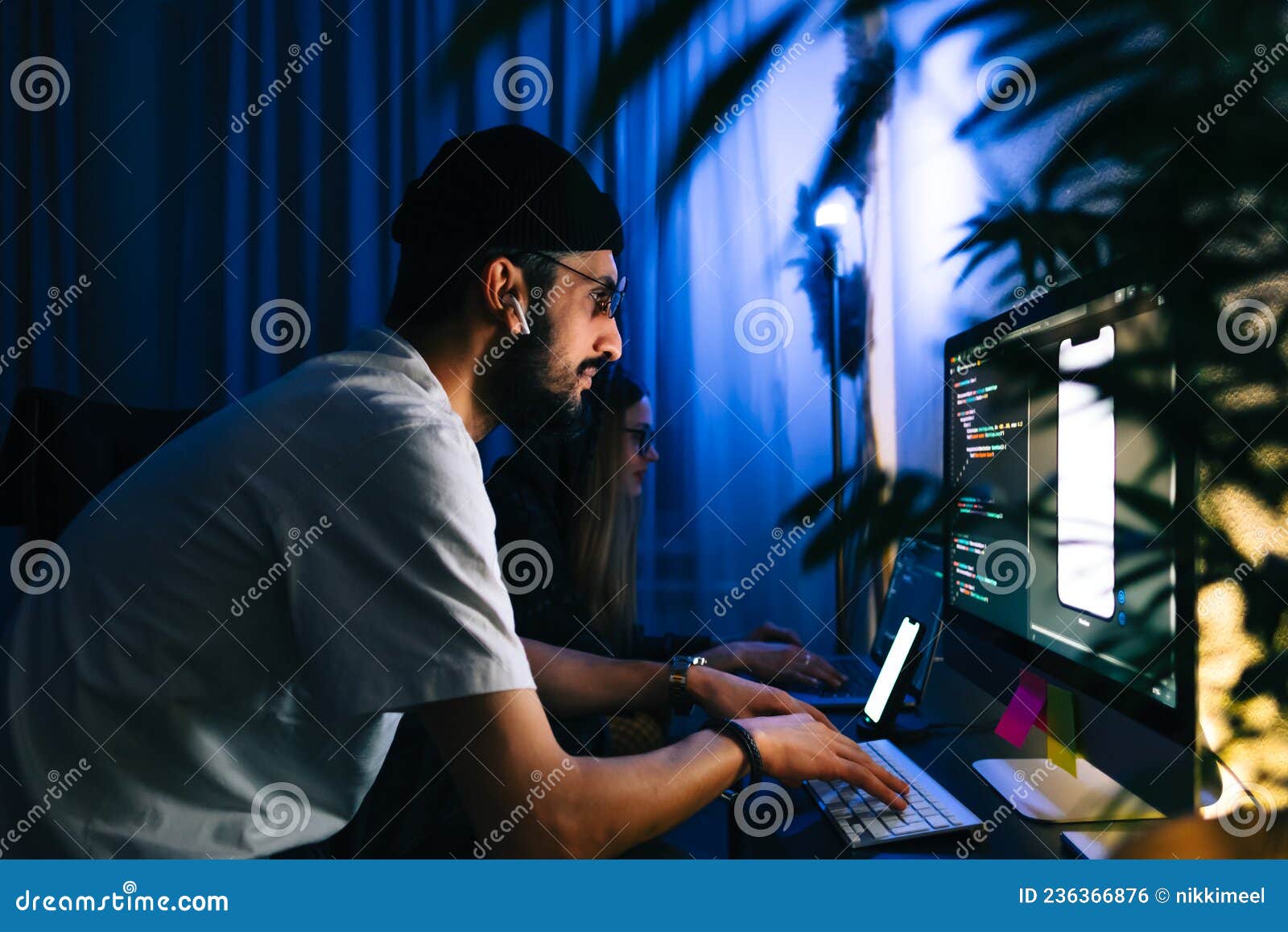 Mobile Developers Team Writes Program Code On A Computer Programmers Work In Home Office Stock