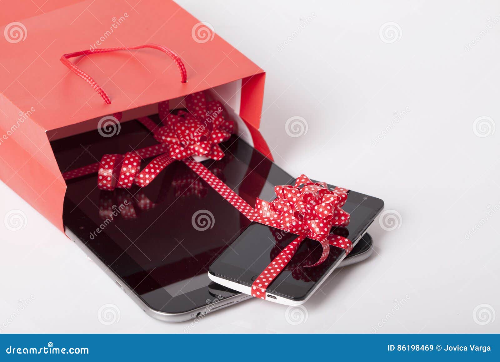 Mobile phone as a gift stock image. Image of xmas, ribbon - 86198469
