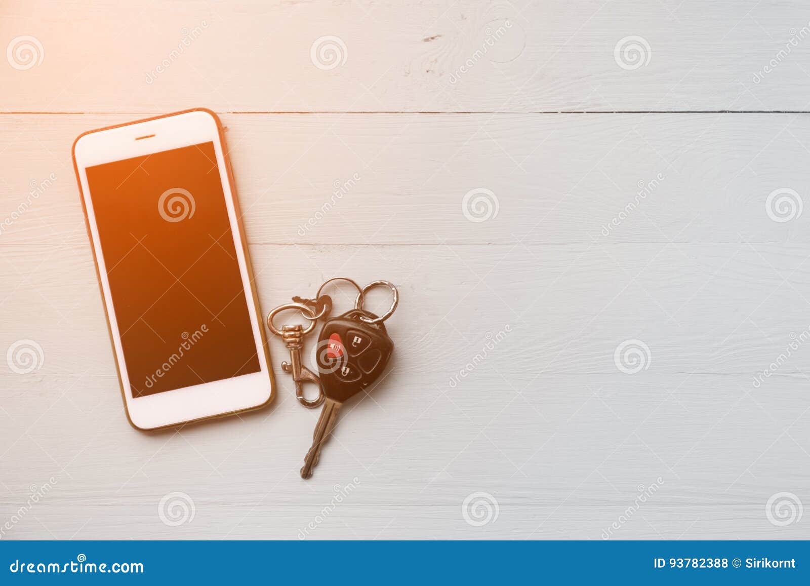 Mobile Phone and Car Remote Keys on Wooden Background Stock Photo ...
