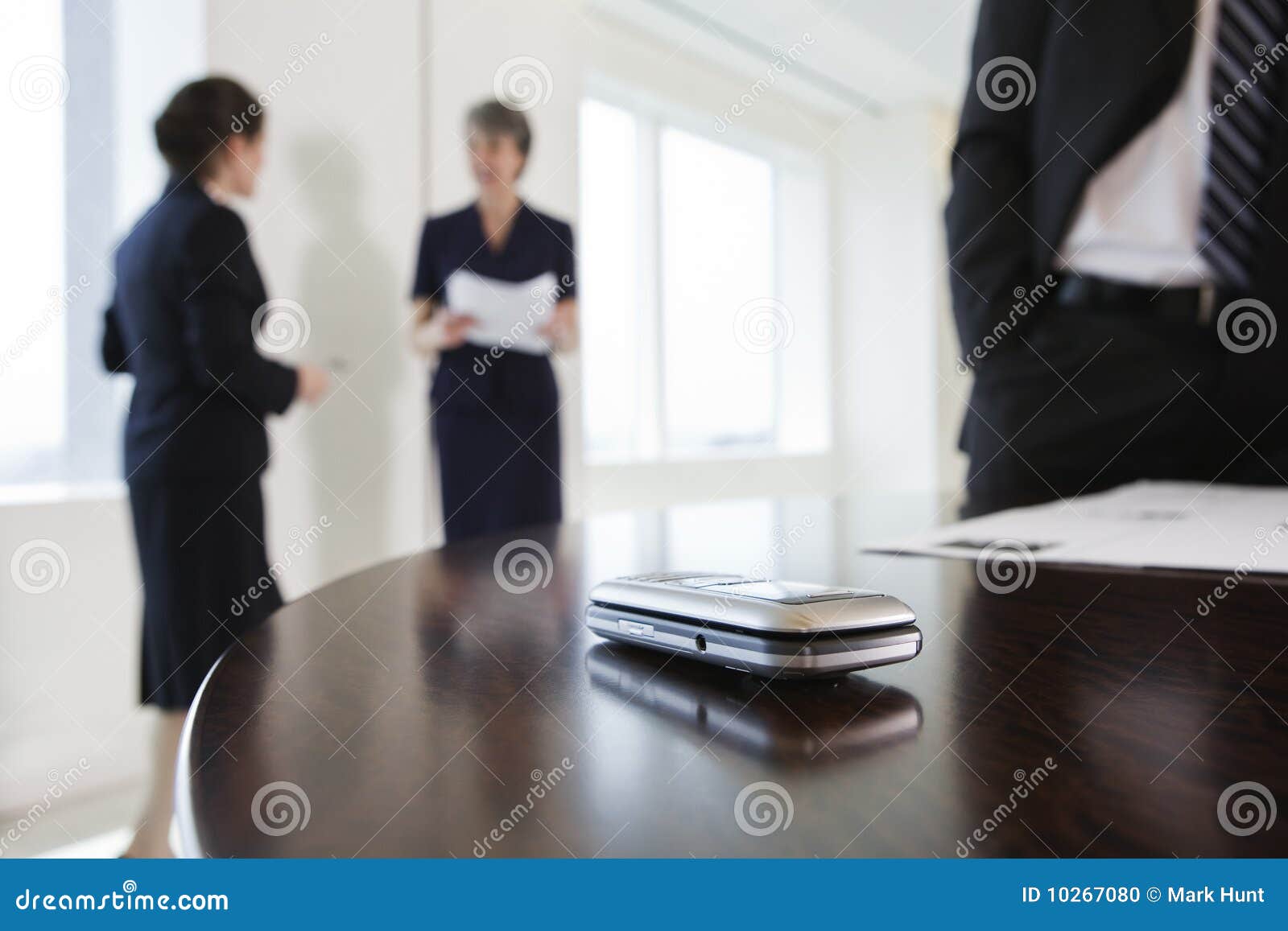 Mobile Phone on Conference Table during Meeting. Stock Photo - Image of ...