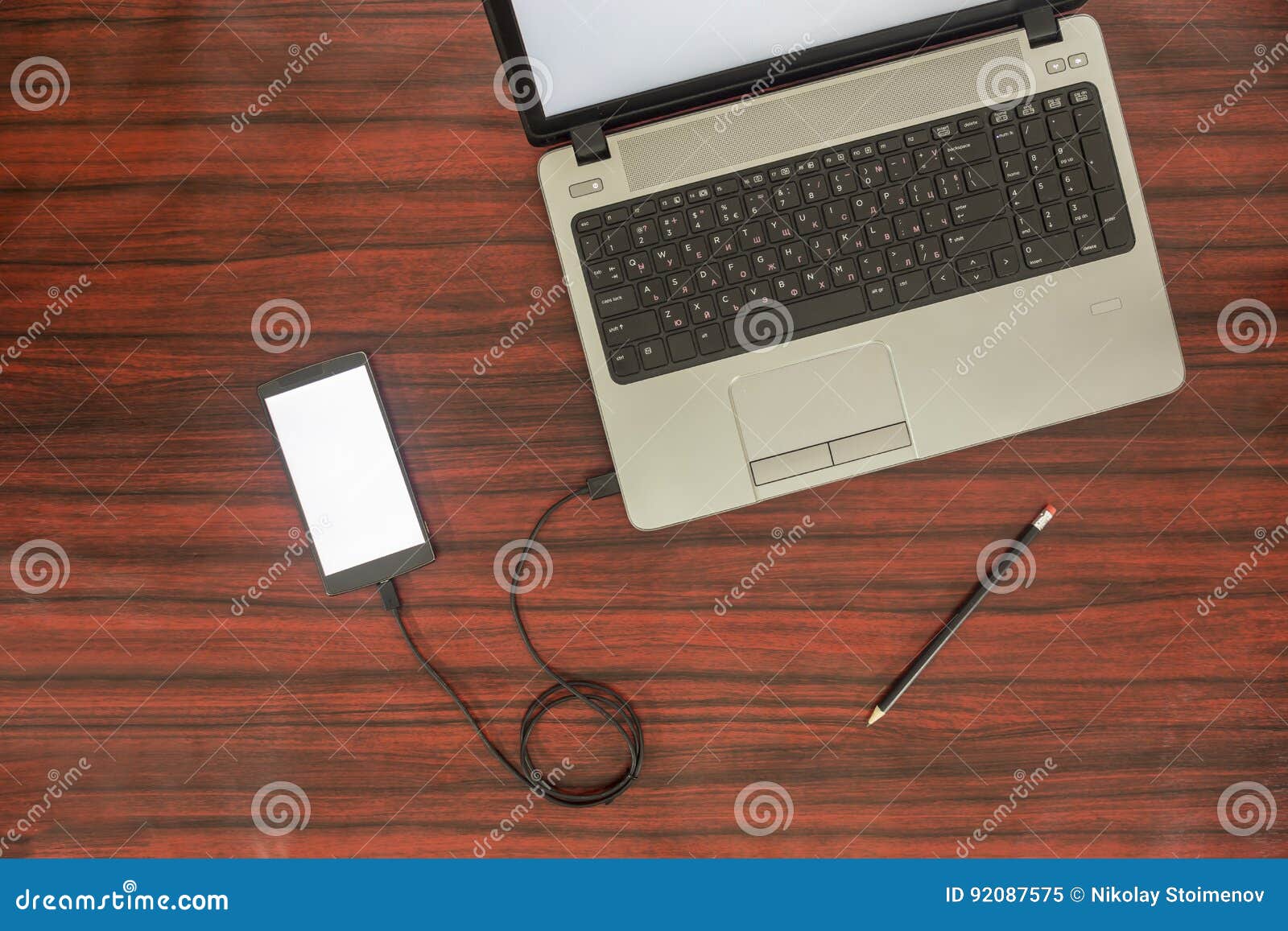 Mobile Phone Connected To Computer. Data Transfer. Stock Image - Image ...