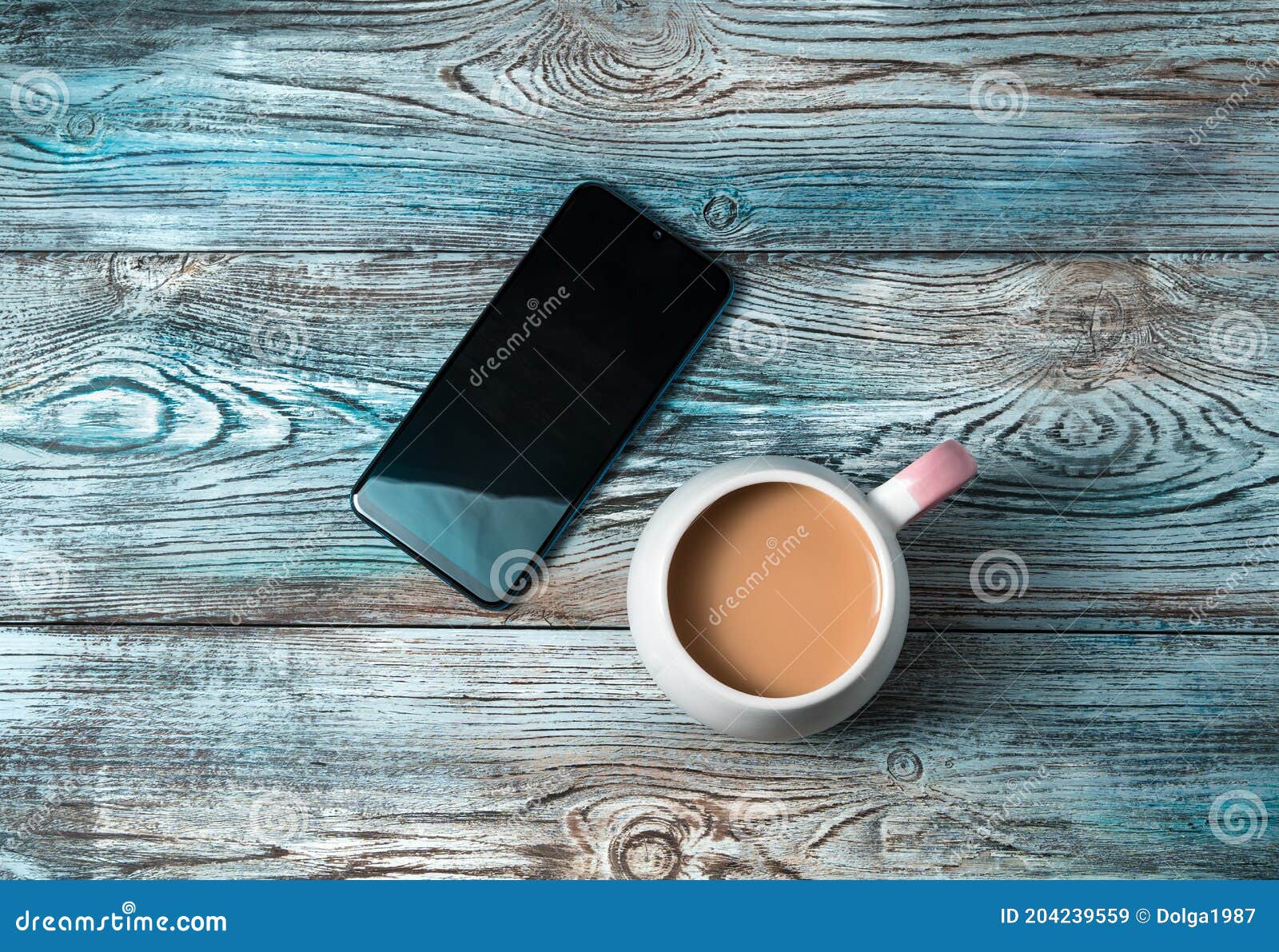 Mobile Phone and a Cup of Coffee on a Wooden Table. Stock Image - Image ...
