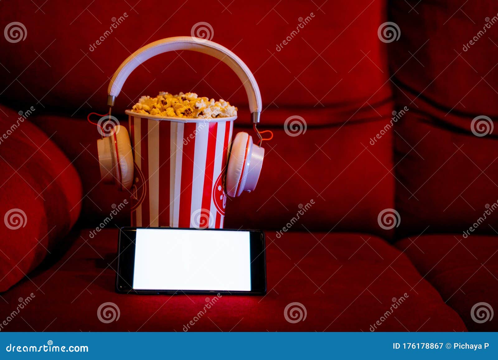 Mobile Phone with Empty White Bright Screen with Popcorn Bucket on the ...
