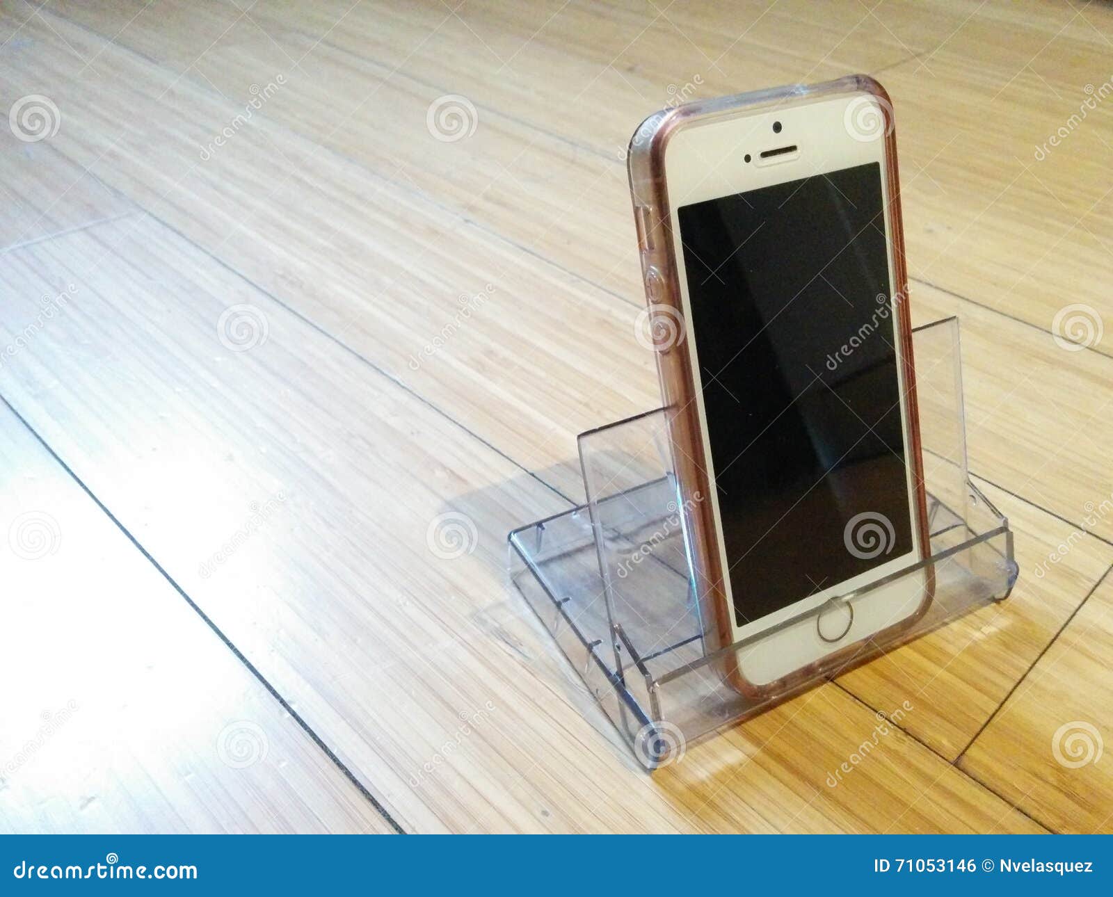 Mobile phone on the floor stock photo. Image of home - 71053146