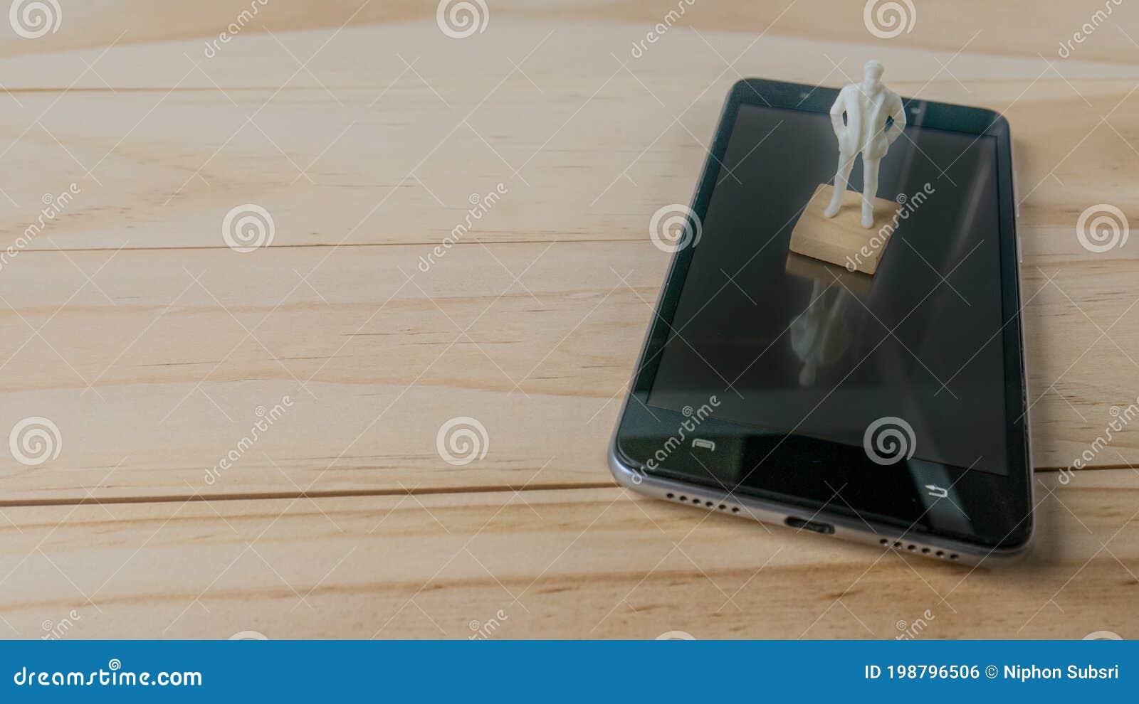 Mobile Phone and Human Figure on Wood Table for Communication Content ...