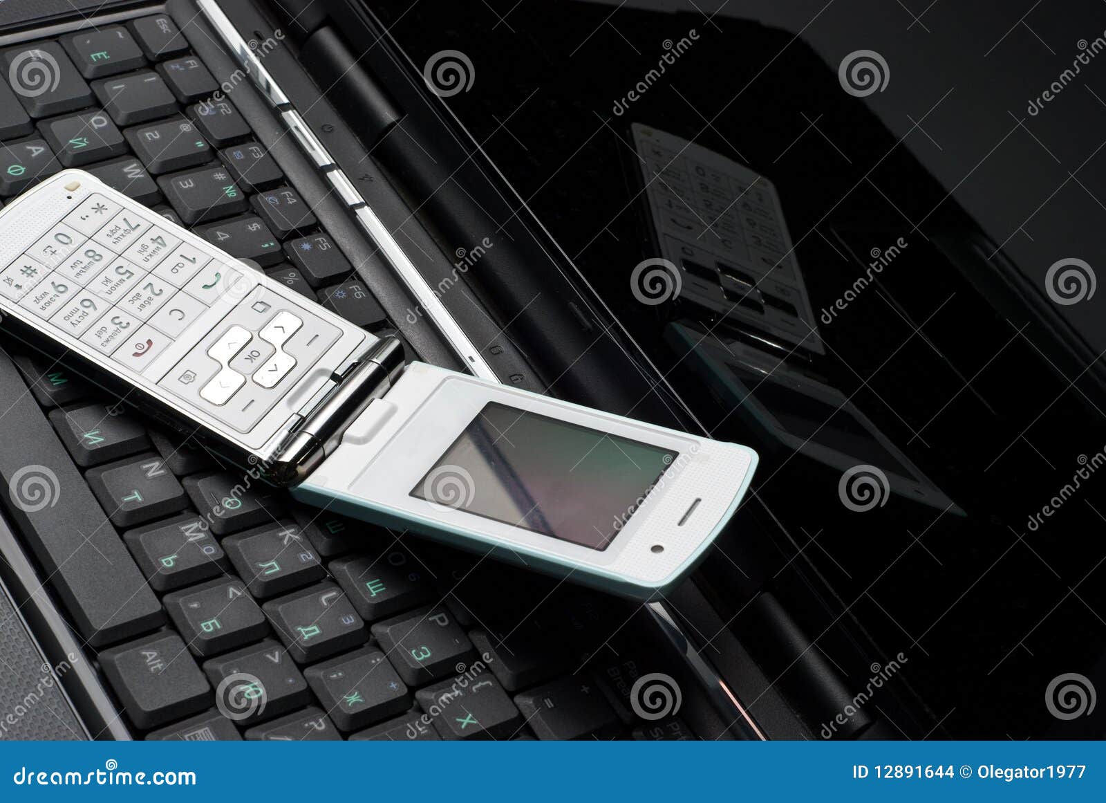 Mobile Phone On A Laptop Picture. Image: 12891644