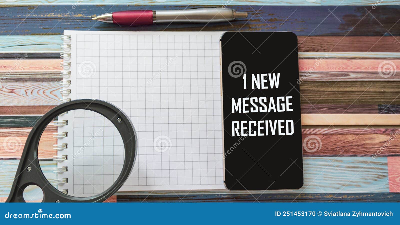 Mobile Phone with a Message about One New Message Received on a Table ...