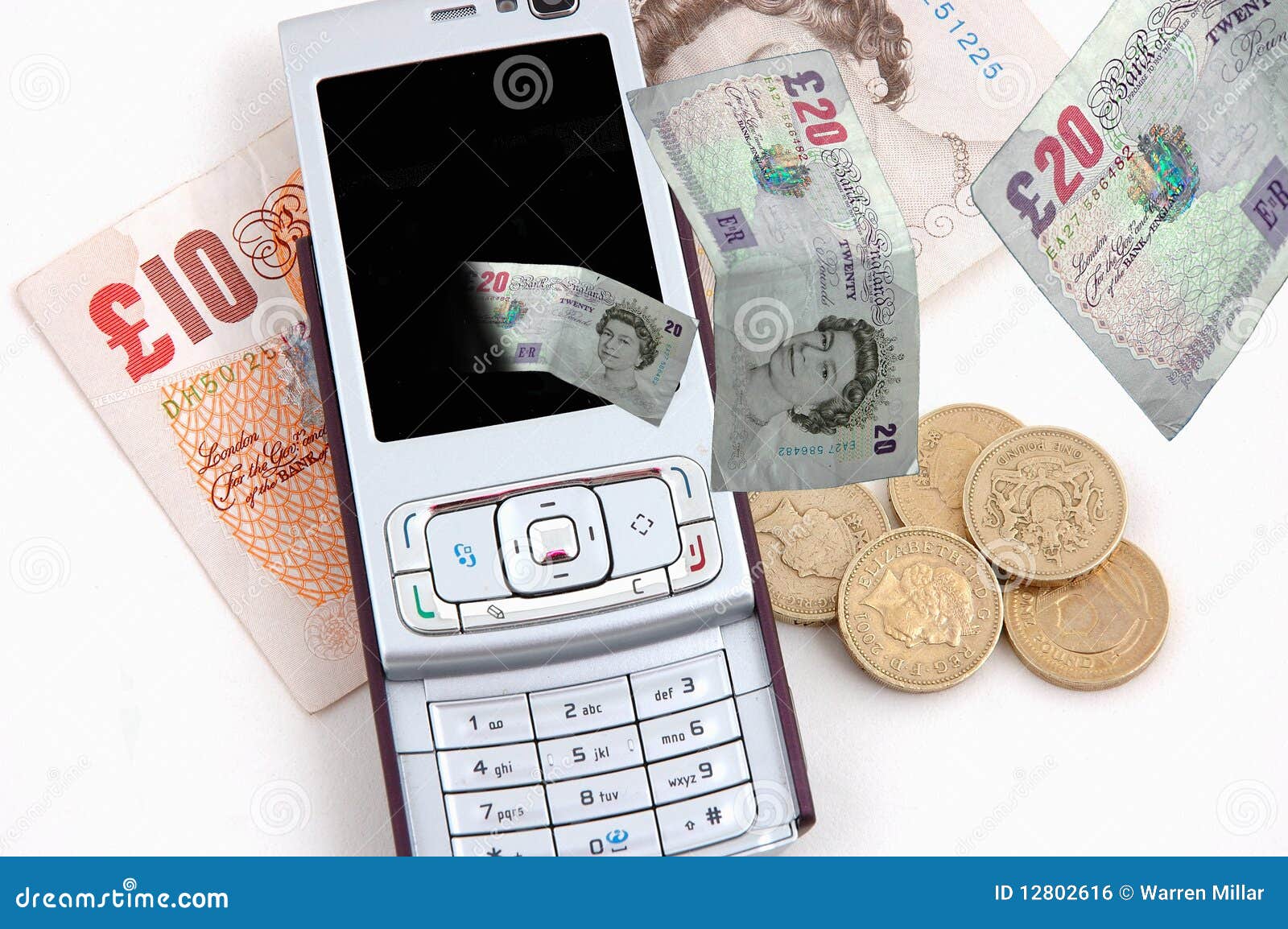 Mobile phone and money stock photo. Image of finance - 12802616