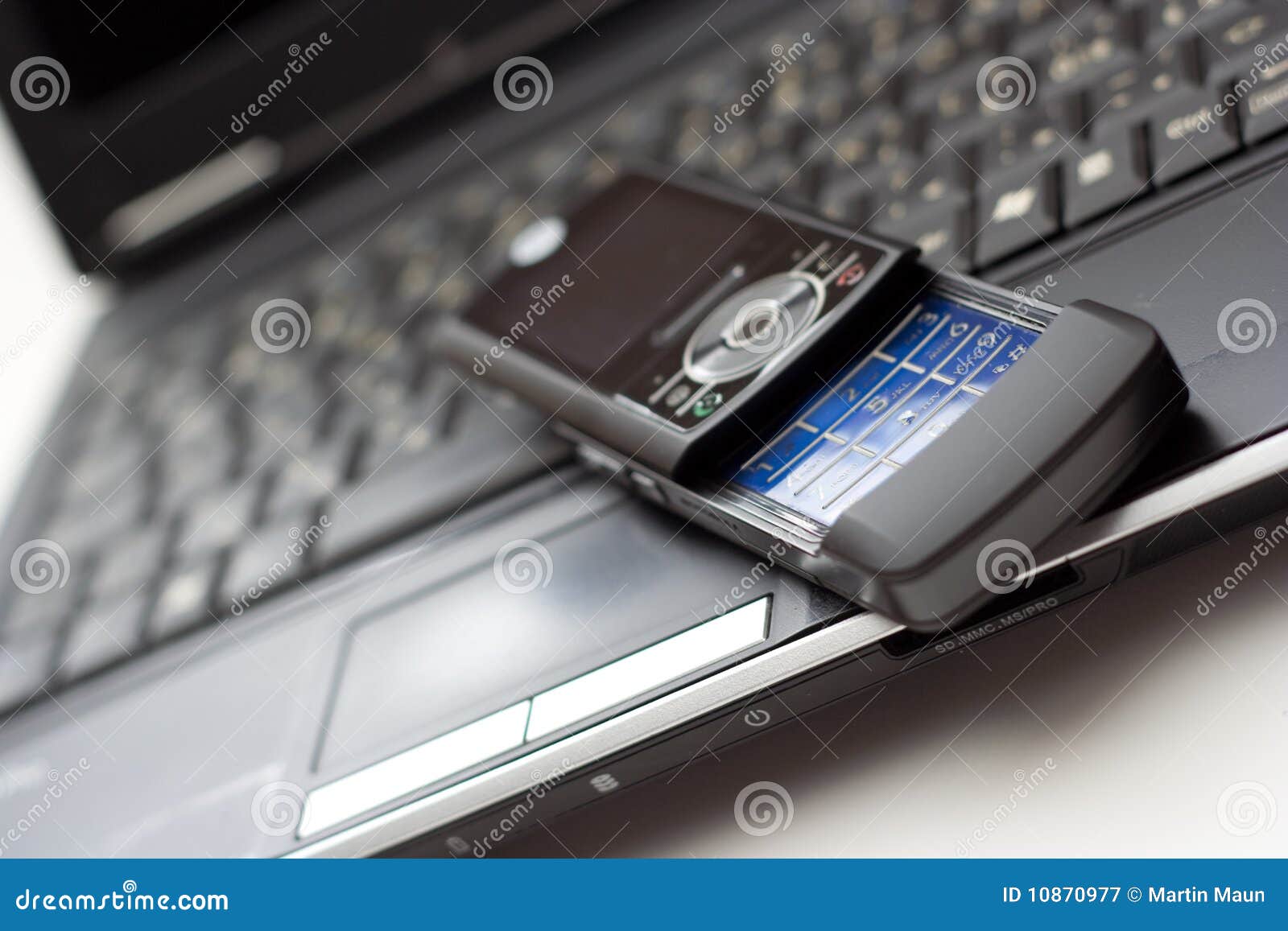Mobile phone and notebook stock image. Image of information - 10870977