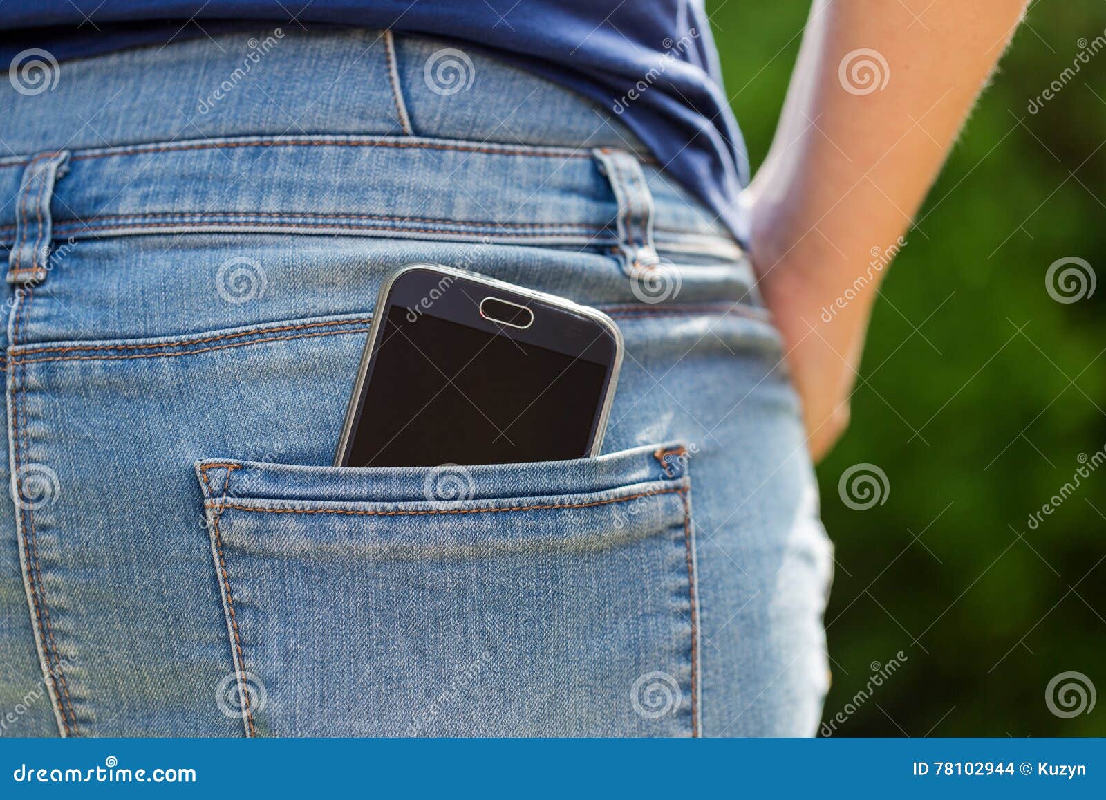 Mobile phone in pocket stock photo. Image of device, summer - 78102944