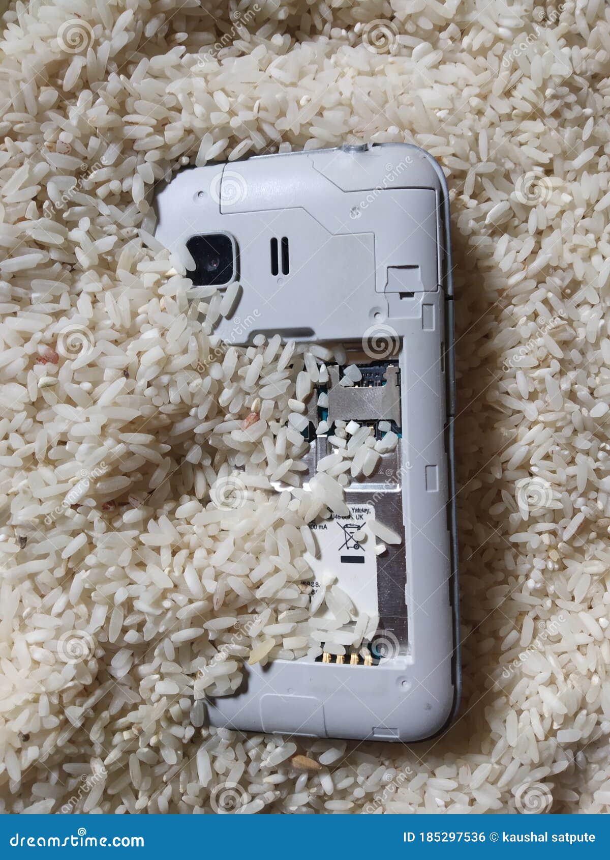Mobile Phone in Rice with Back Camera and Battery Stock Photo - Image ...