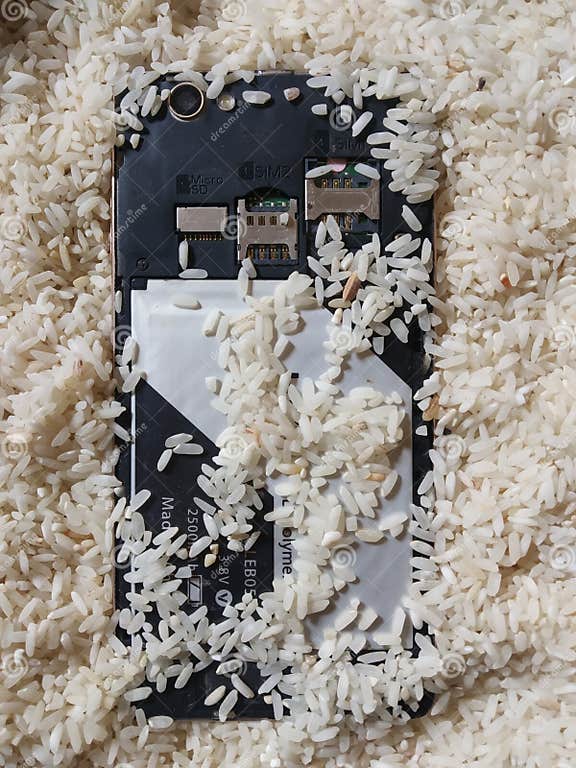Mobile Phone in Rice with Battery Editorial Photography - Image of ...