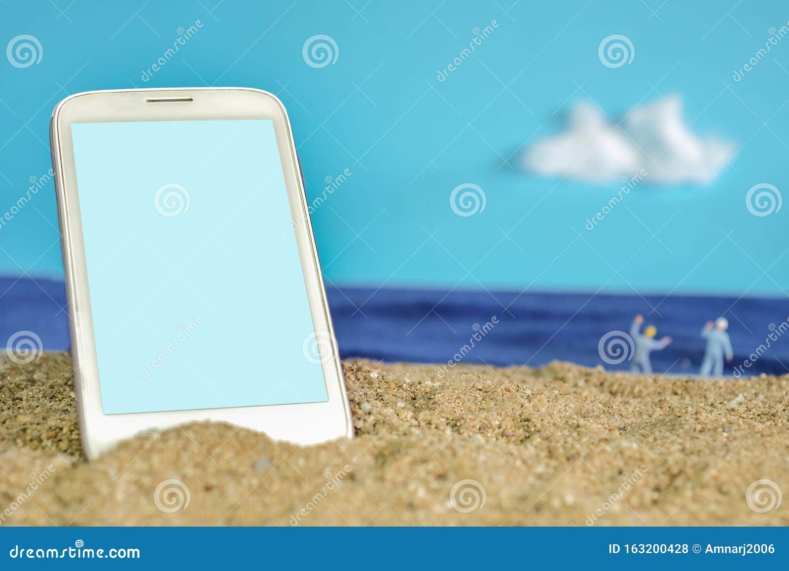 Mobile phone on sea beach stock photo. Image of mobile - 163200428