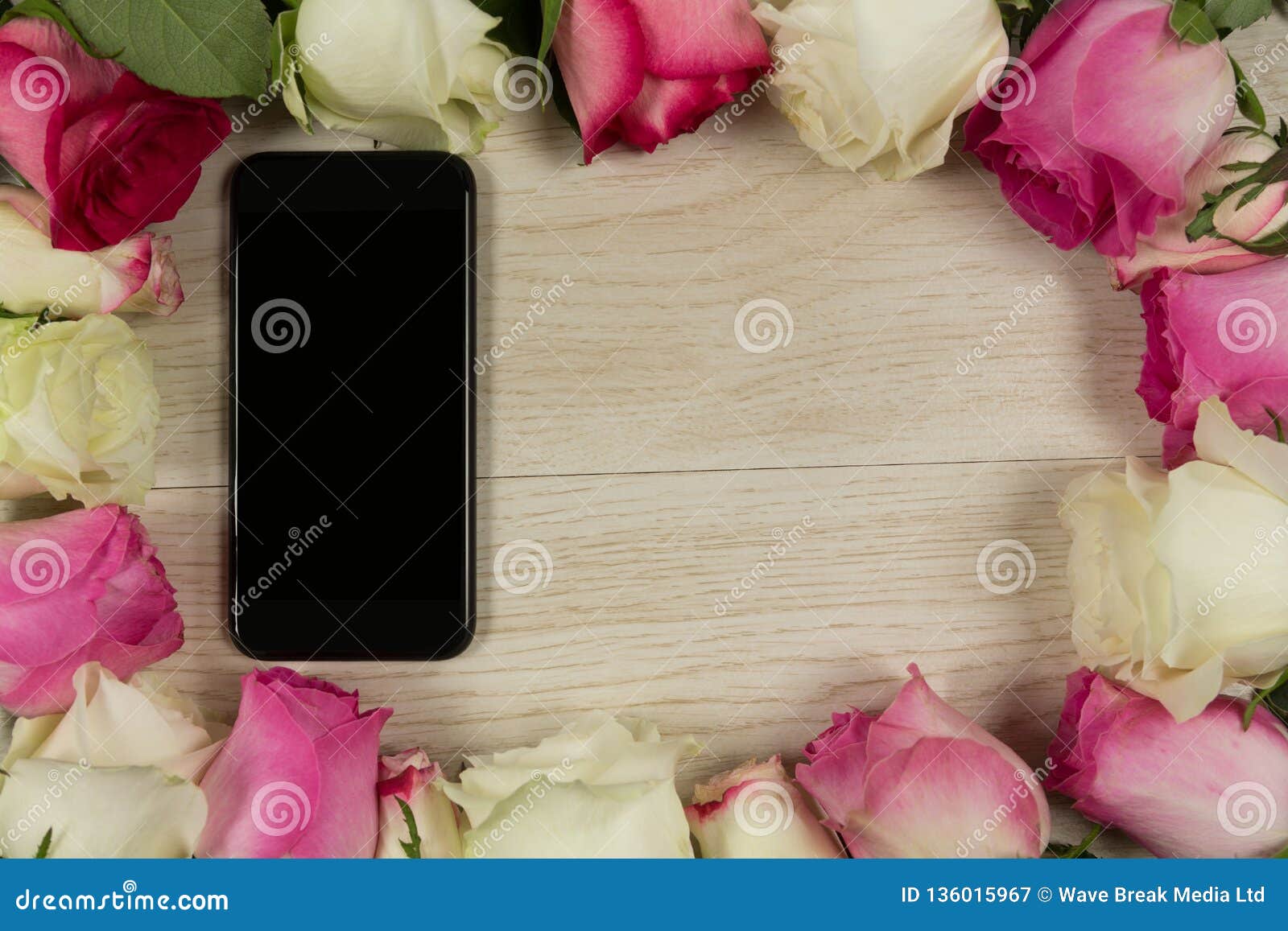 Mobile Phone Surrounded with Rose Flower Stock Image - Image of phone ...