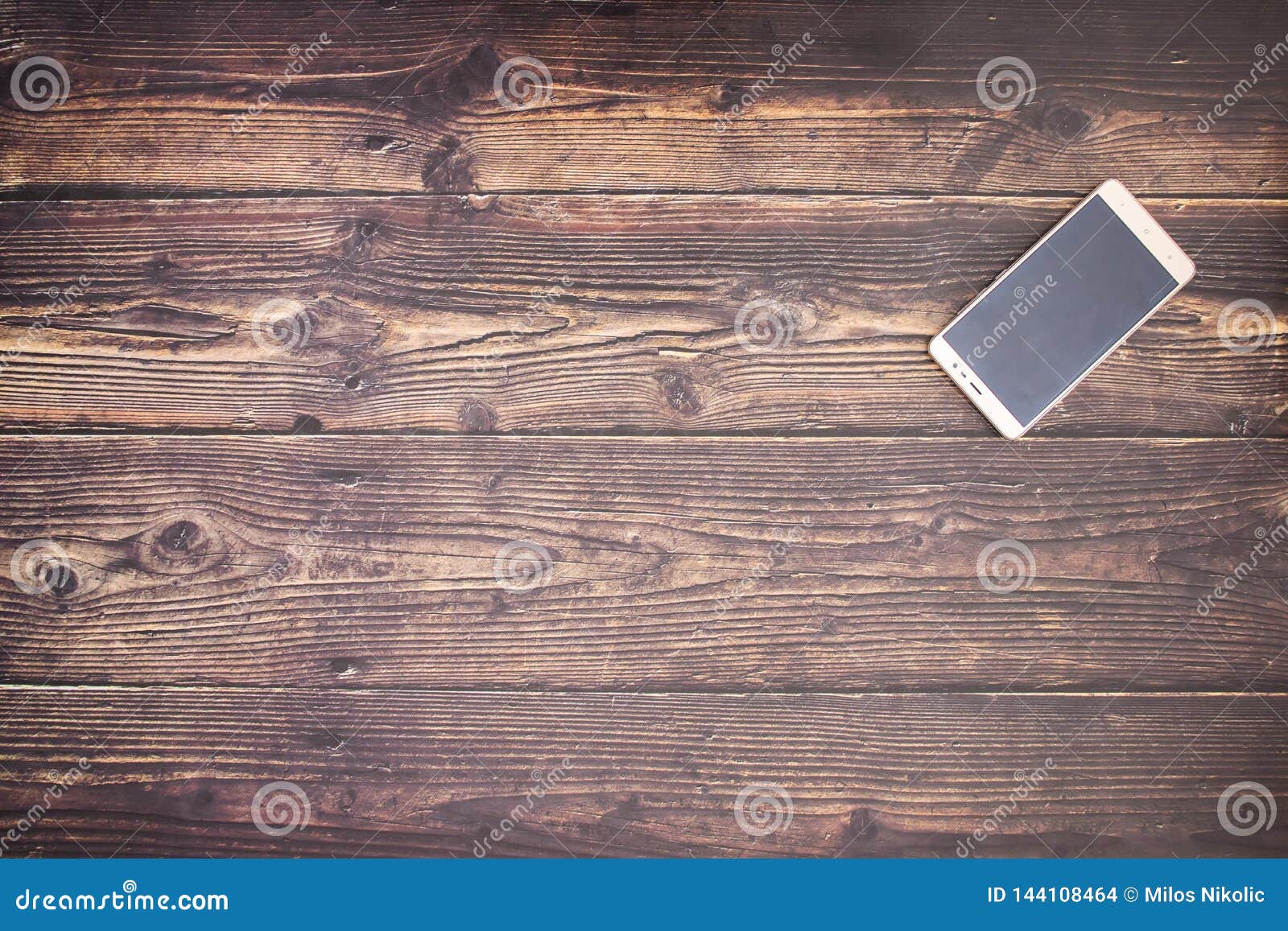 Mobile phone on the table stock photo. Image of decoration - 144108464
