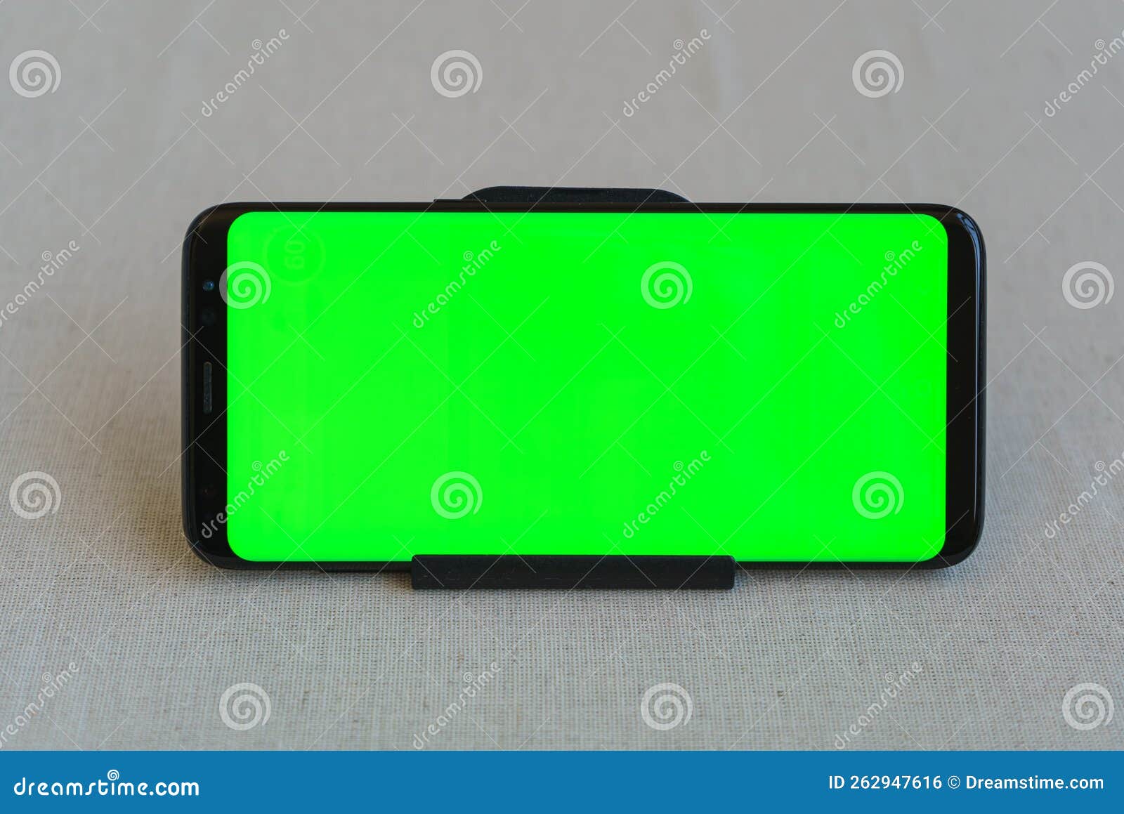 Mobile Phone on Table Horizontally with Green Screen Stock Photo ...