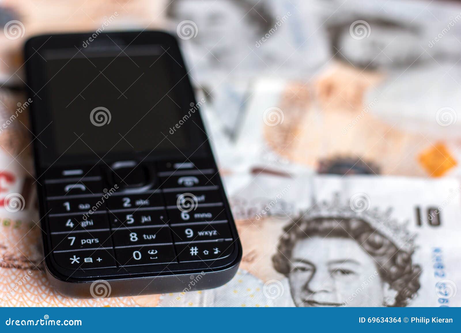 Mobile Phone and UK Ten Pound Notes Stock Photo - Image of telephone ...