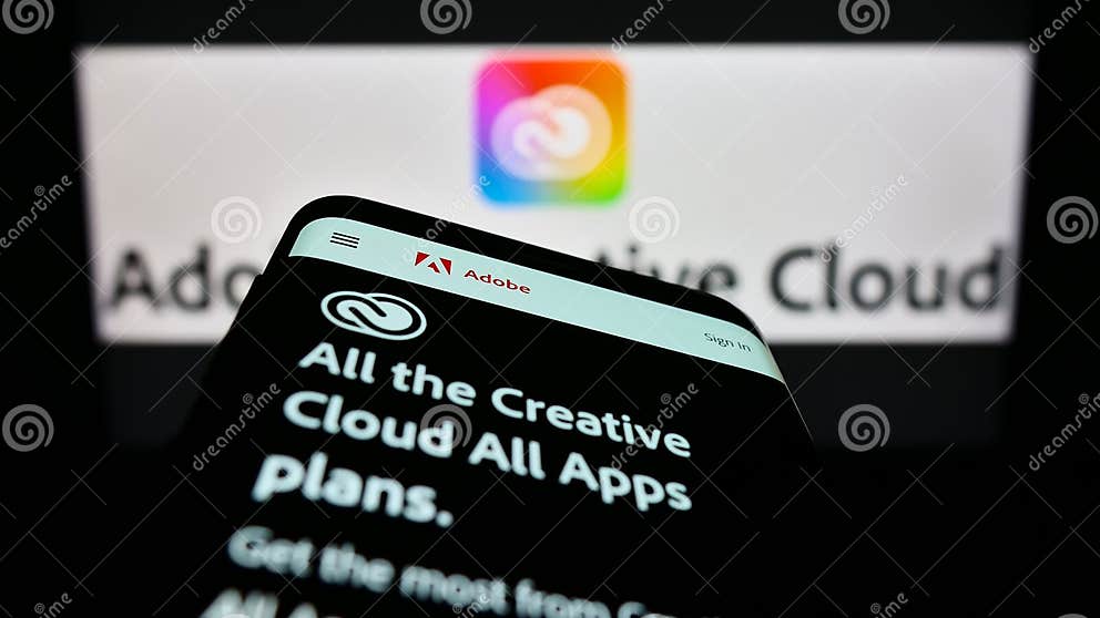 Mobile Phone with Website of Software Adobe Creative Cloud on Screen in Front of Company Logo ...