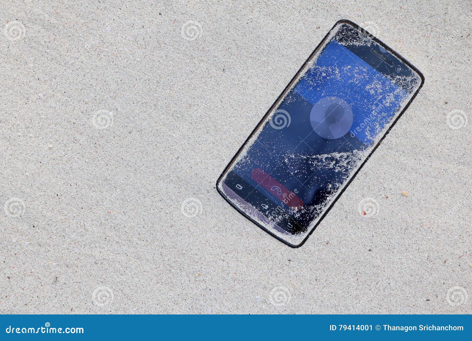 Mobile phones in the sand. stock image. Image of expensive - 79414001